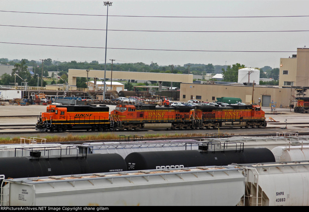 BNSF 2742 Sits on a lashup with 2 Dash9's.